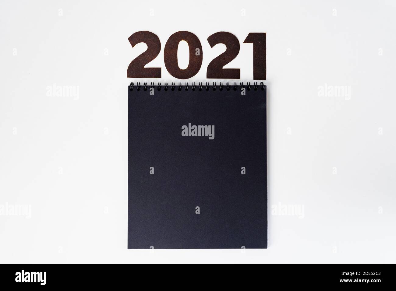 Black notepad with number 2021 on white background top view Stock Photo ...