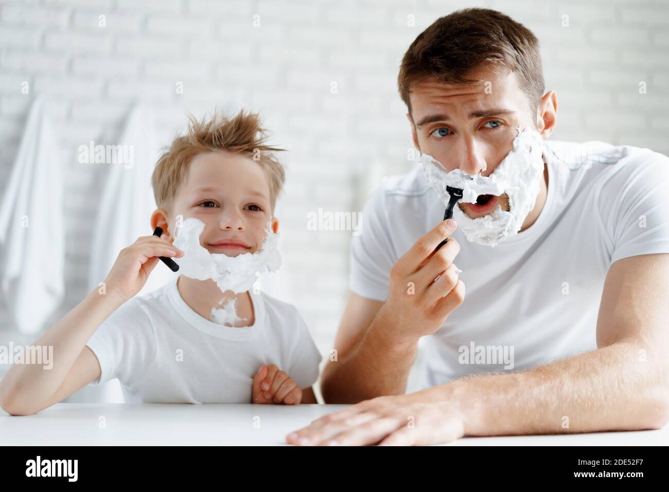 Father and his little son shaving together Stock Photo - Alamy