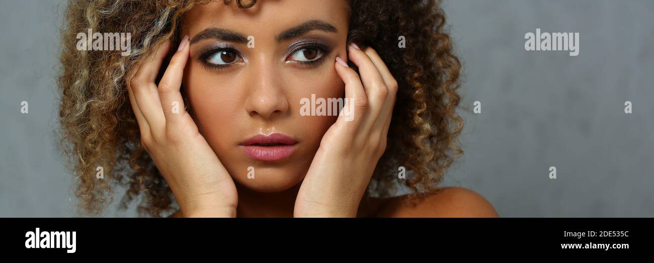 Close up of emotional female that touching her face Stock Photo - Alamy