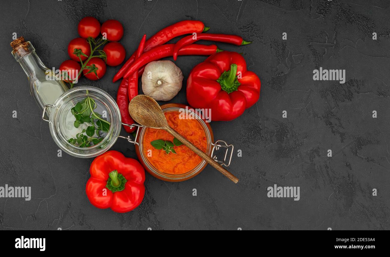 Traditional autumn Balkan vegan spread Ajvar or Aivar with ingredients ...