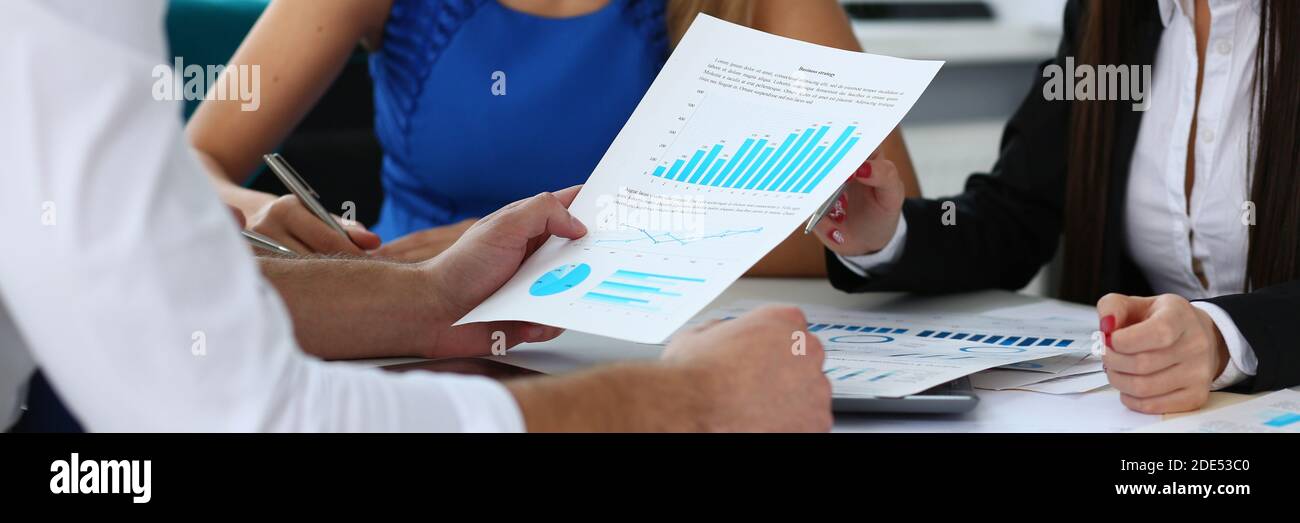 Group of people working together at their project Stock Photo - Alamy