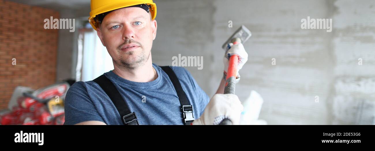 Real strong man working at building object Stock Photo - Alamy
