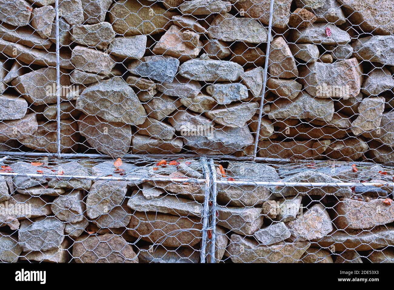 support stone wall in metallic net, texture for your design Stock Photo ...