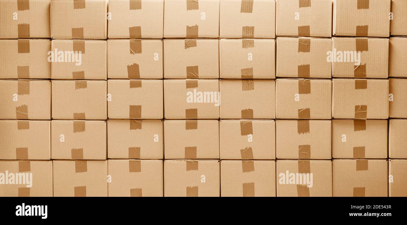 Cardboard boxes texture for delivery or moving. Stack of boxes and blue ...