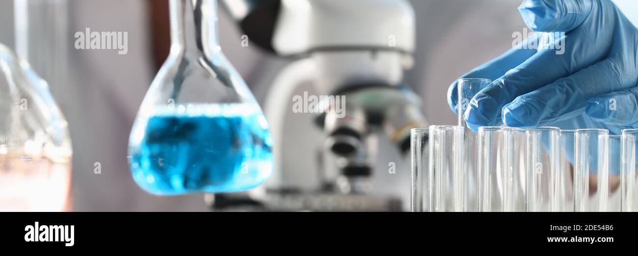 Close up of scientist that working with test tubes Stock Photo - Alamy