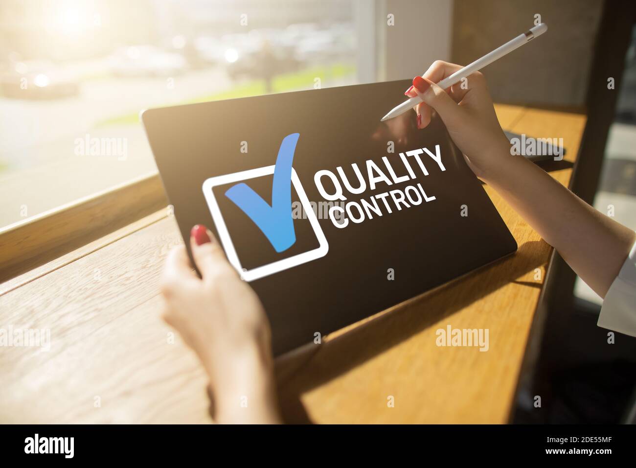 Quality control check box on device screen. Standards and certification ...