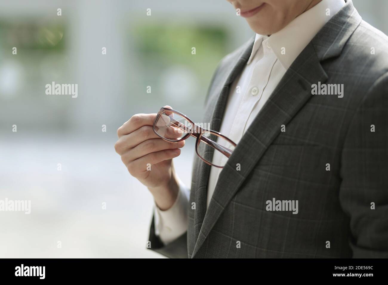 Taking off eyeglasses hi-res stock photography and images - Alamy