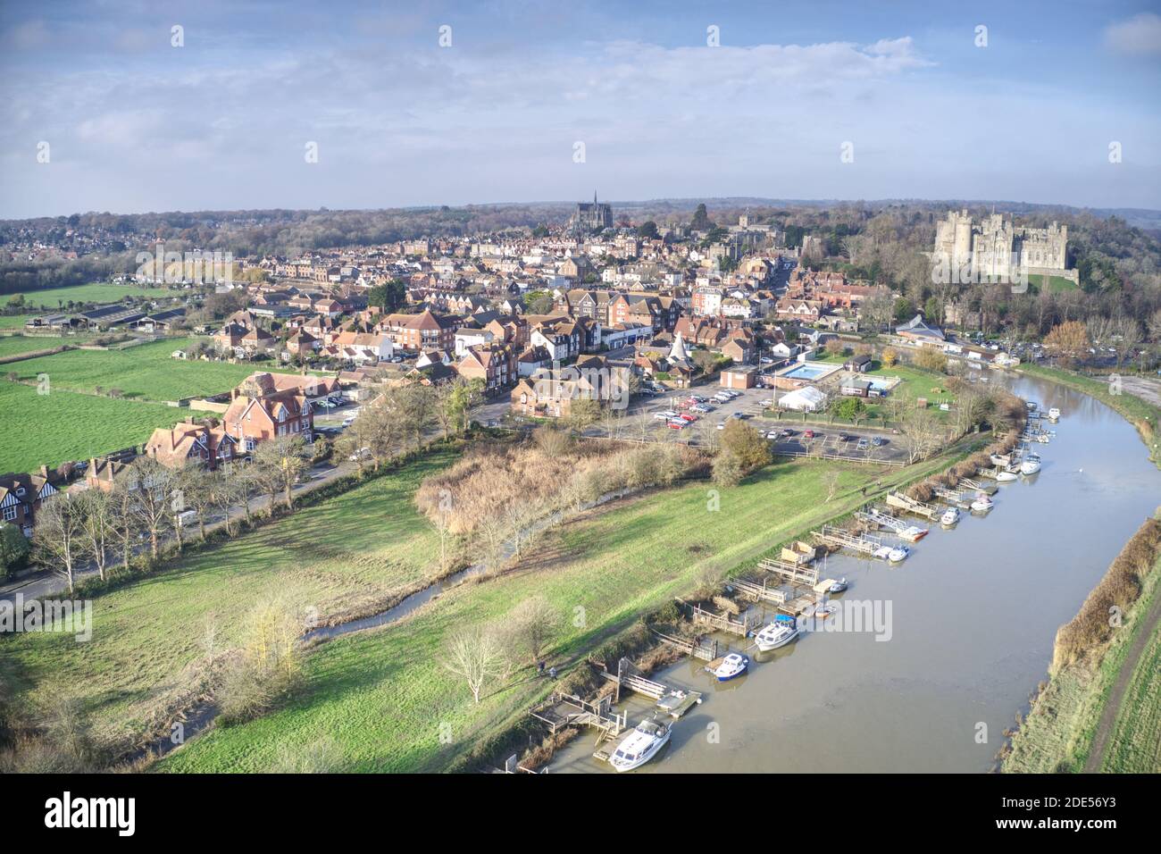 Boats moored on the River Arun in the historic town of Arundel in ...