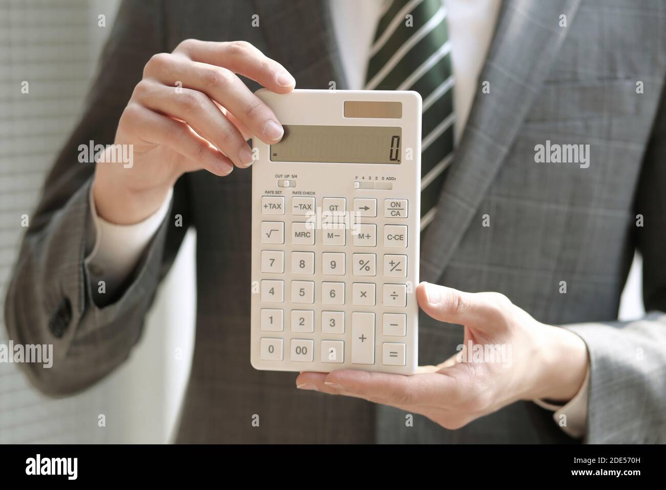 Analyzing tax calculation calculator calculate hi-res stock photography ...