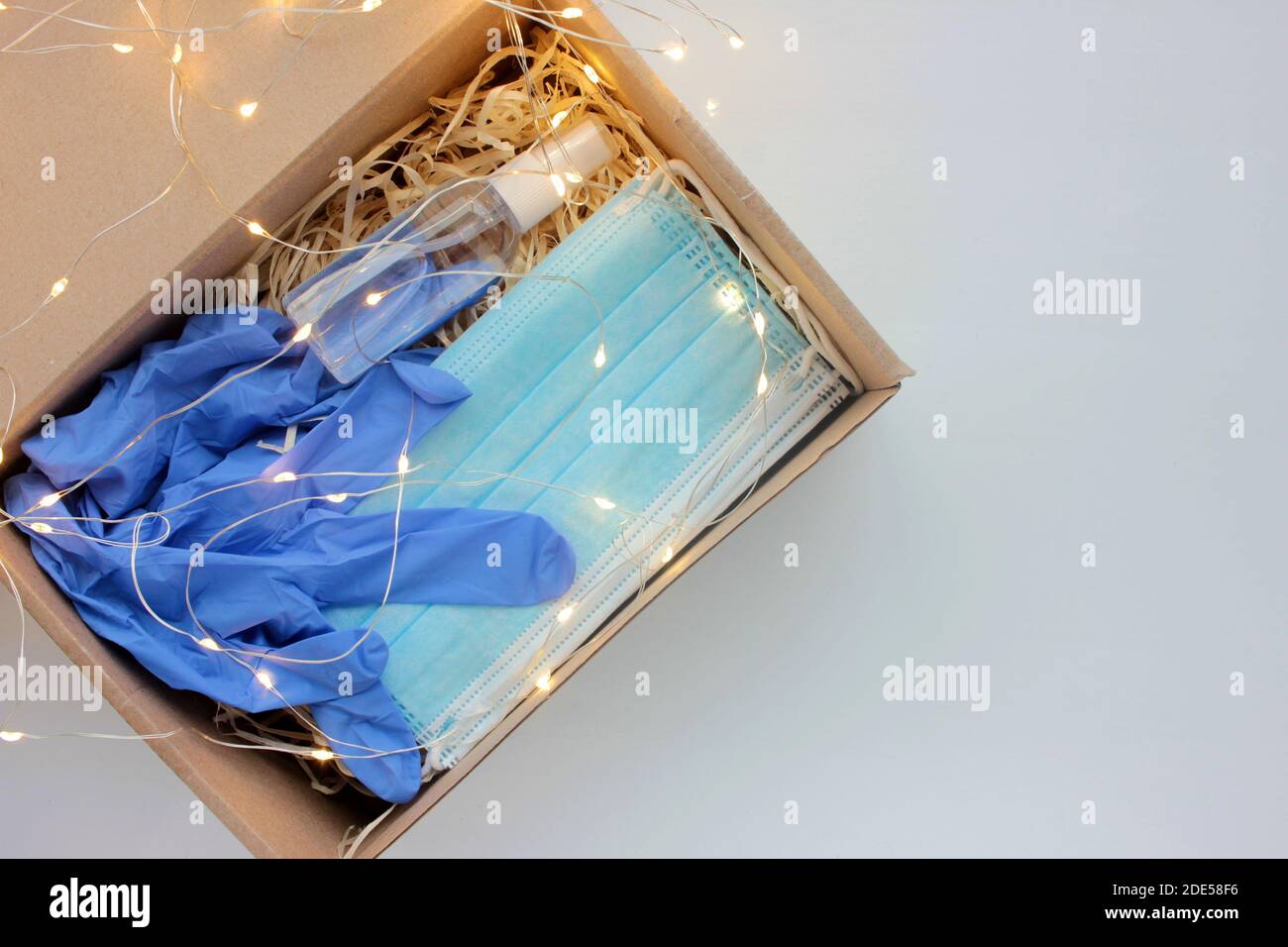 Gift box with anti-COVID-19 protective gear for healthcare. Survival ...