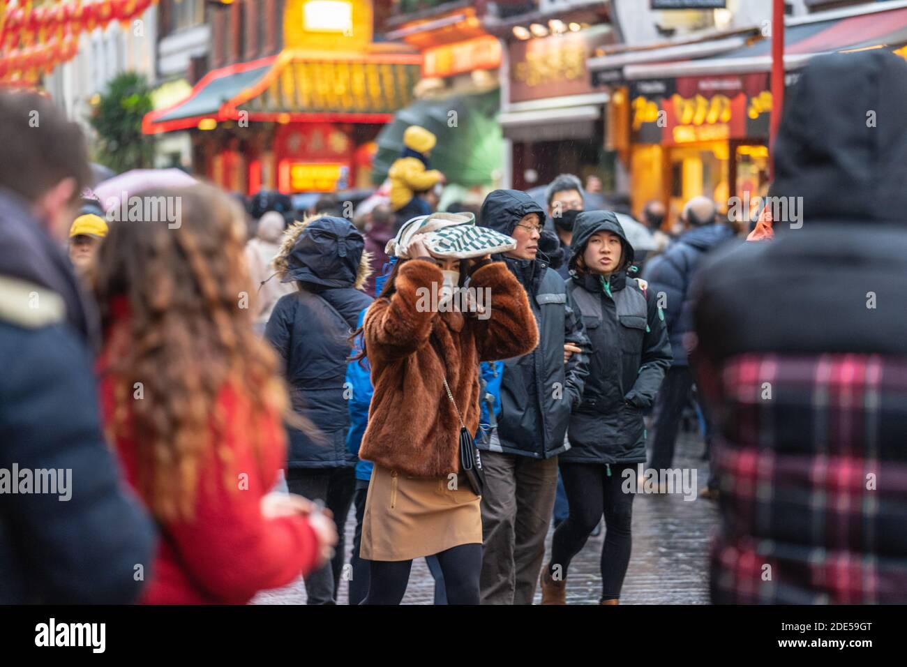 London, January 26, 2020. London Chinatown street scene on a rainy day ...