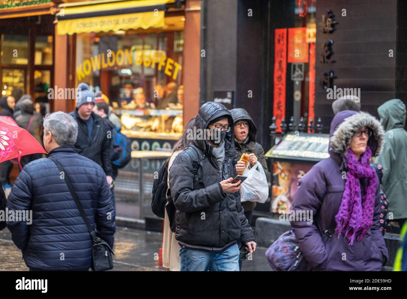 London, January 26, 2020. London Chinatown street scene on a rainy day ...