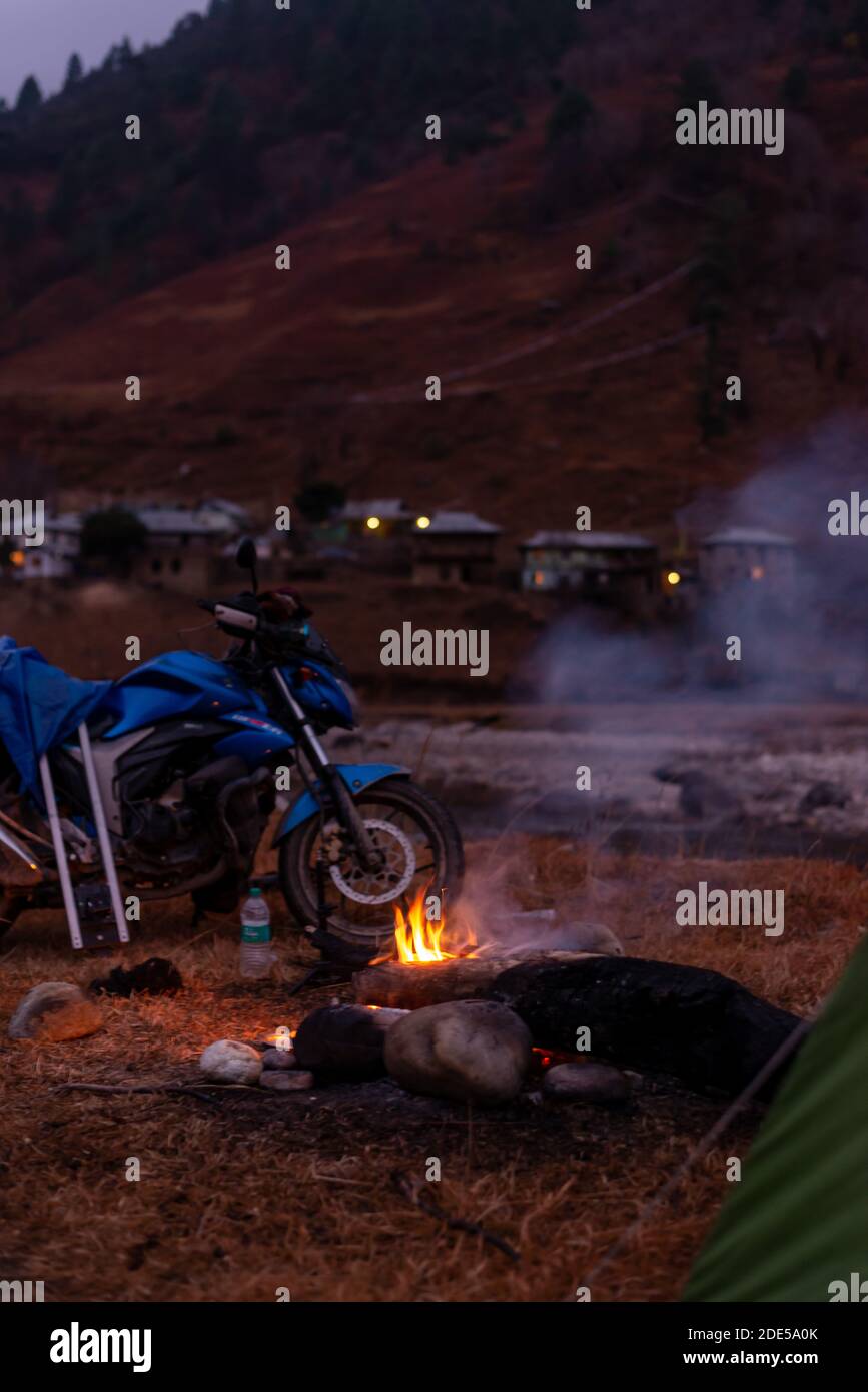 Photo of Motorcycle camping cooking bonfire in arunachal Stock Photo ...