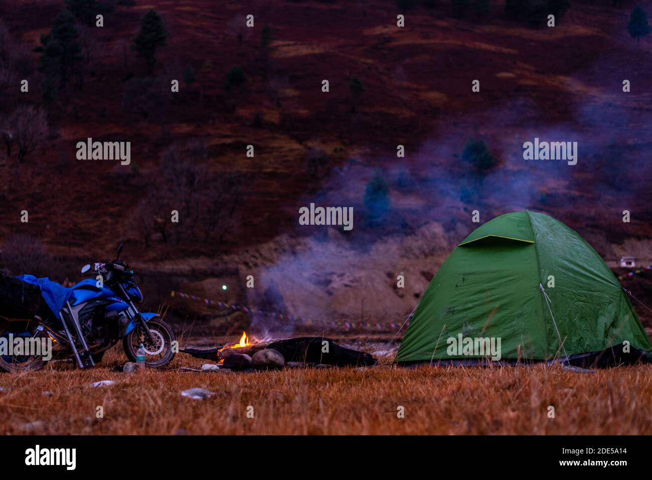 Photo of Motorcycle camping cooking bonfire in sangti valley arunachal ...