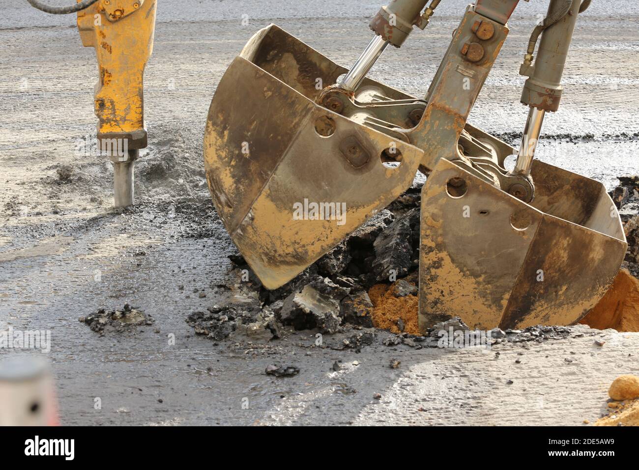 roadworks with two shell demolition grab Stock Photo - Alamy