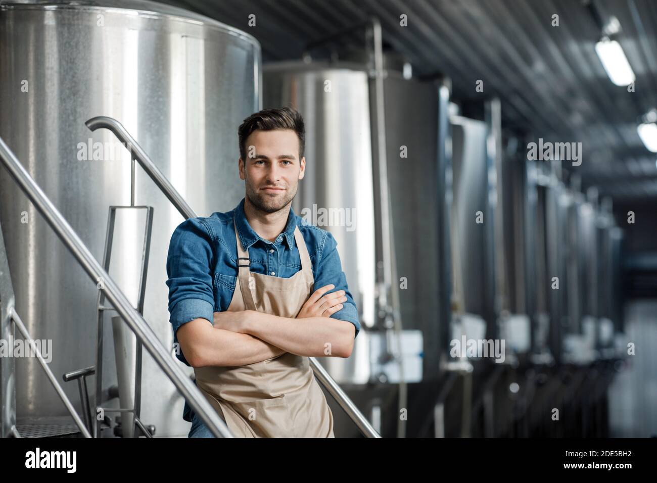 Work in modern brewery and favorite job Stock Photo - Alamy