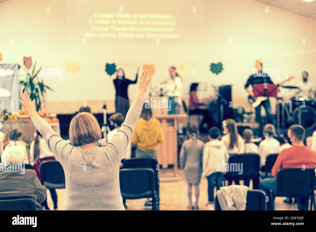 People praying in a church. soft focus of christian people group raise ...
