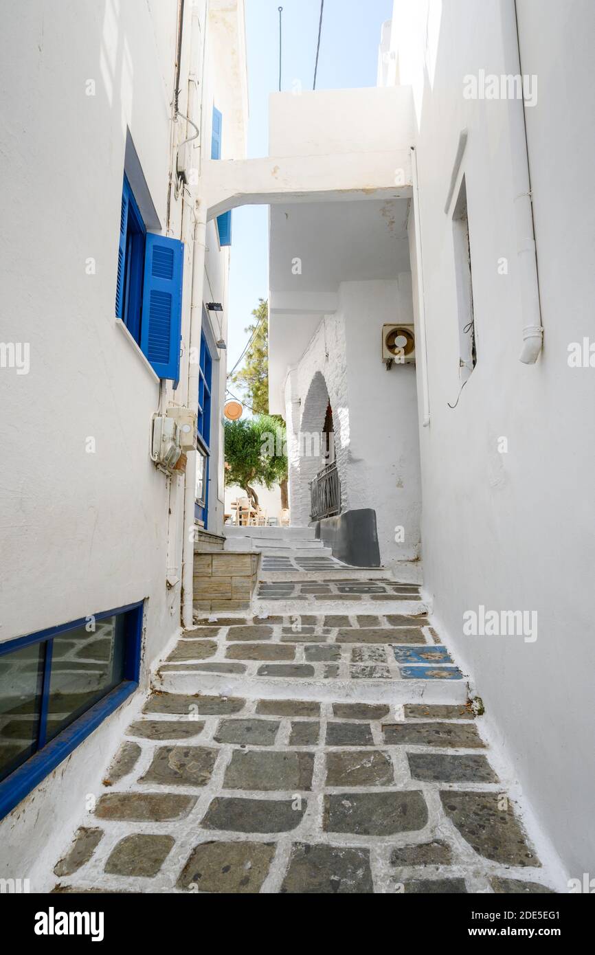 A street in the old town of Chora, the capital of Ios Island ...