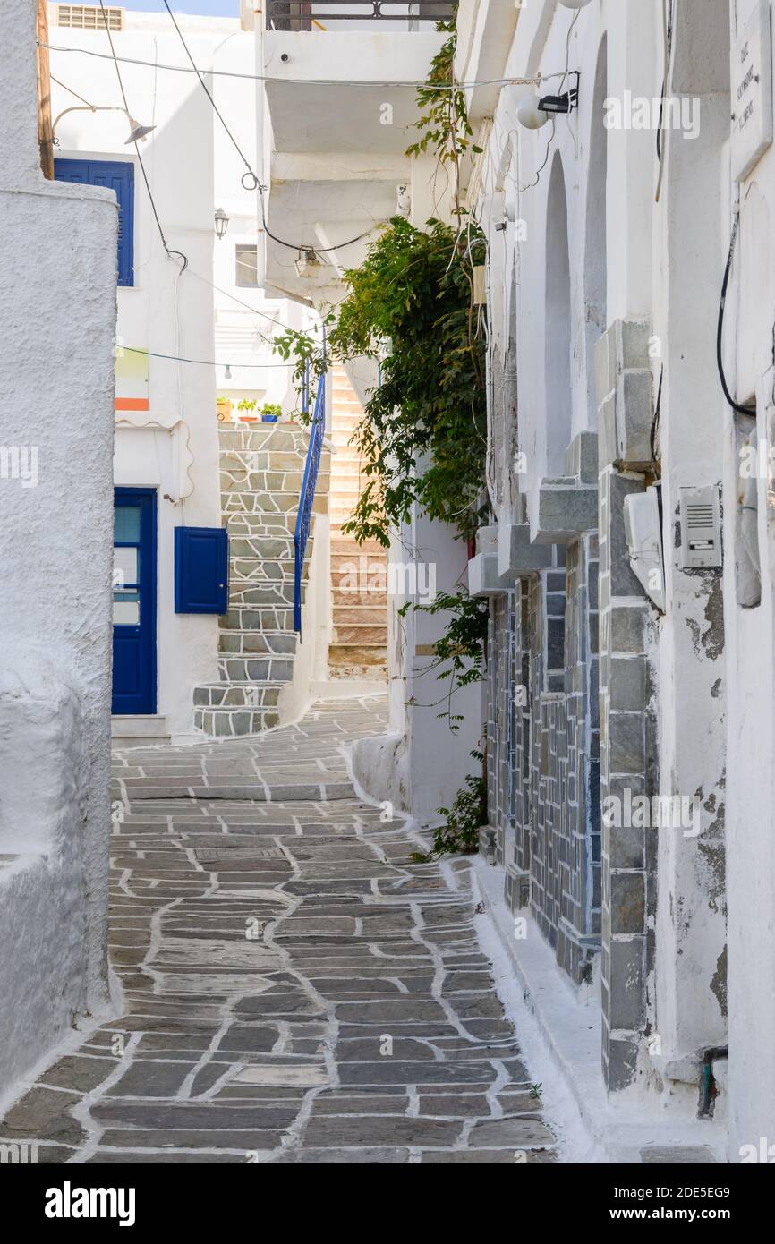 A street in the old town of Chora, the capital of Ios Island ...