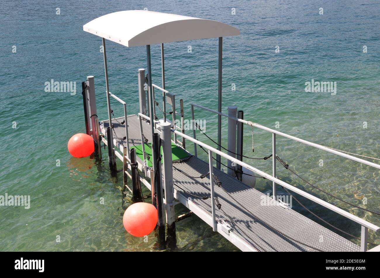 Jetty on lake Como Stock Photo - Alamy