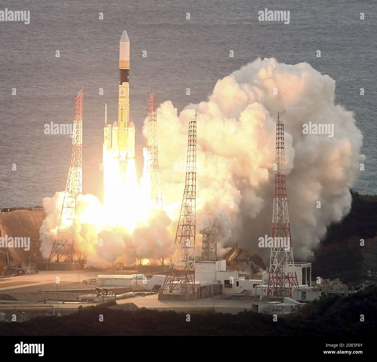 Photo taken from a Kyodo News helicopter shows the launch of an H2A ...