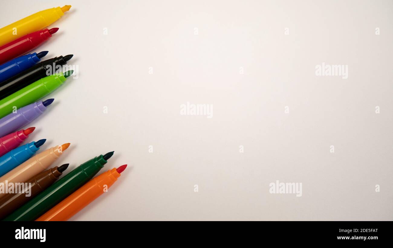 Different colors of felt tip pens on white background. Craft work ...