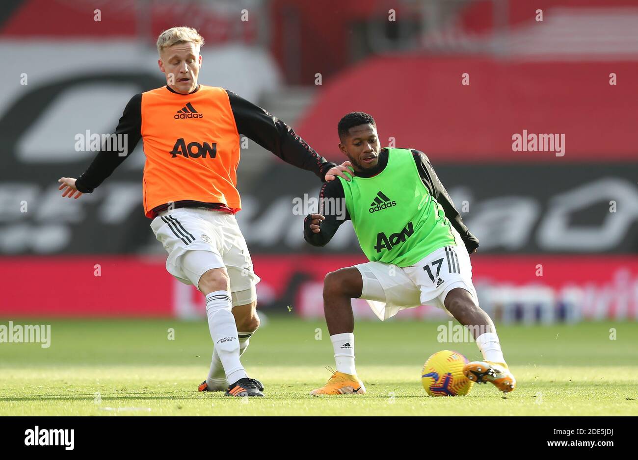 Manchester United's Donny van de Beek (right) and Fred warming up ...
