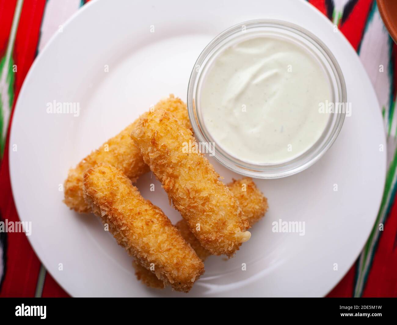 cheese sticks - fried breaded cheese served with creamy sauce. Asian ...