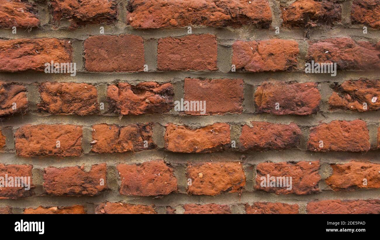 Old rustic weathered and worn red brick wall full frame Stock Photo - Alamy