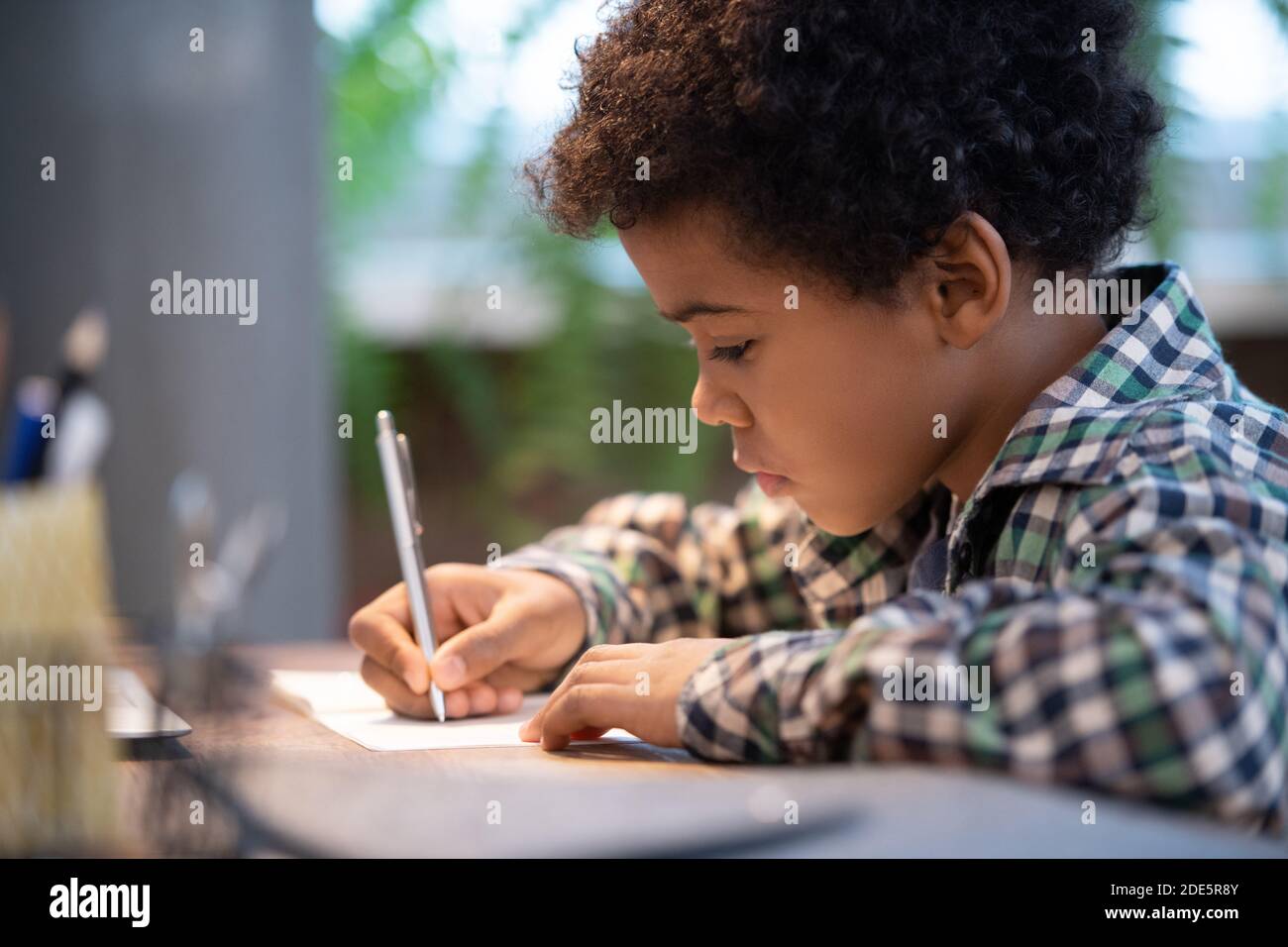 African child reading back view hi-res stock photography and images - Alamy