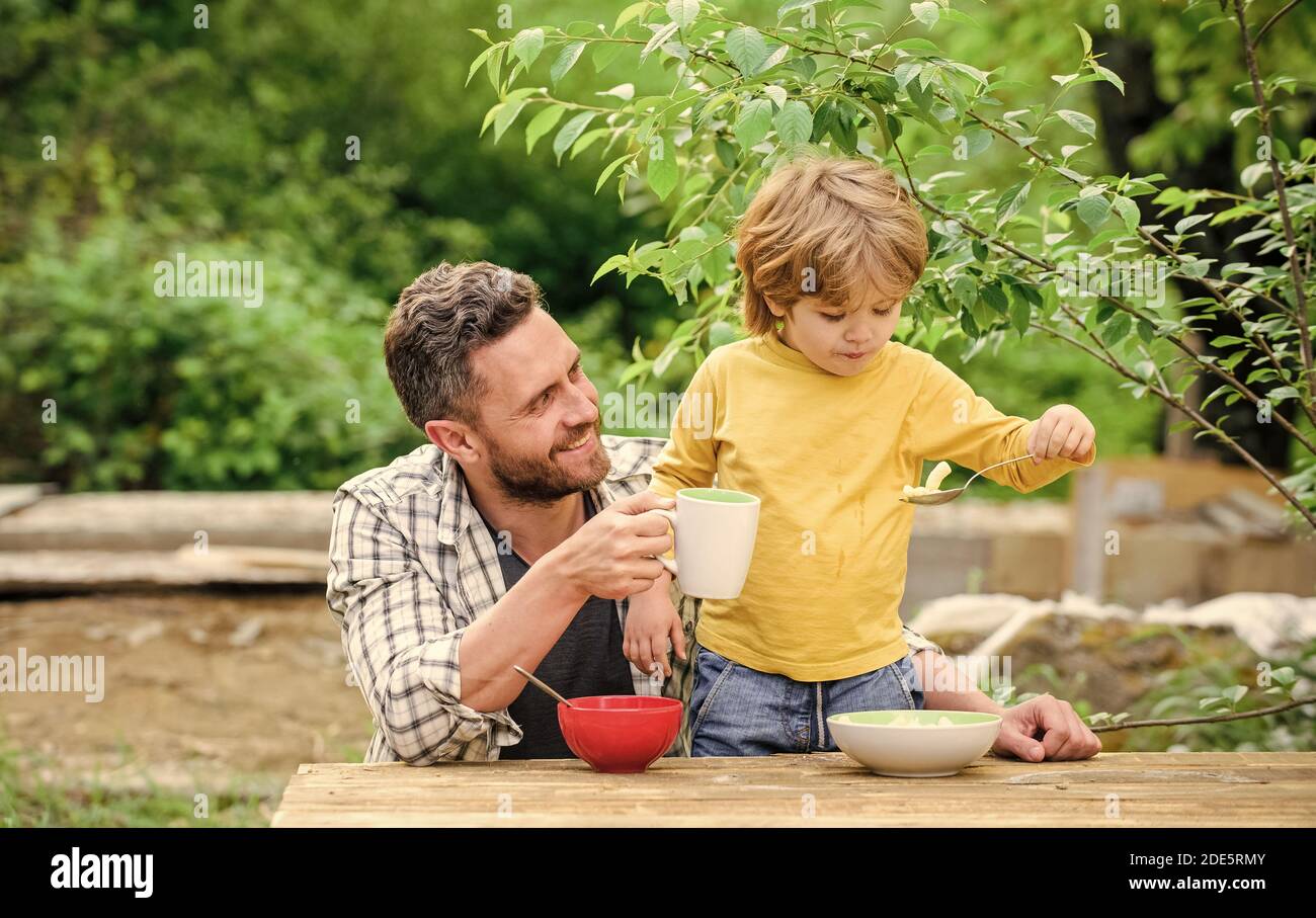 Healthy food concept. Father son eat food and have fun. Menu for ...