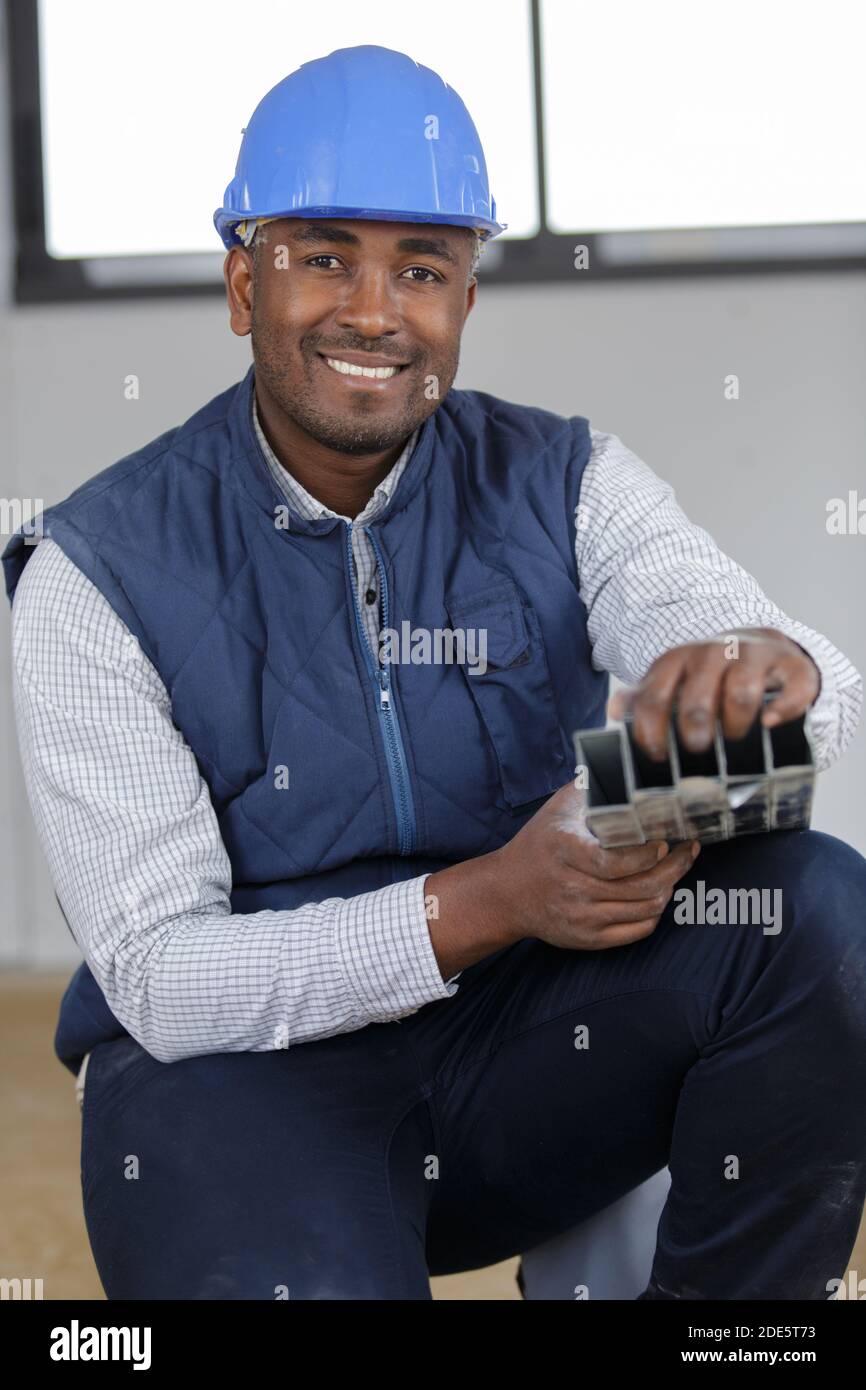 Worker carrying rebar hi-res stock photography and images - Alamy