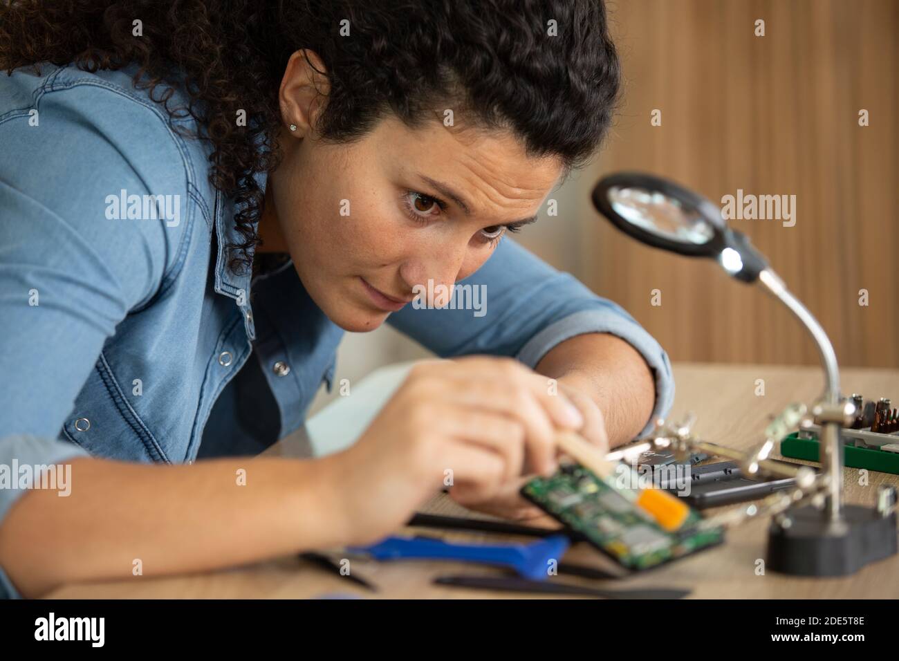 Repairing something hi-res stock photography and images - Alamy