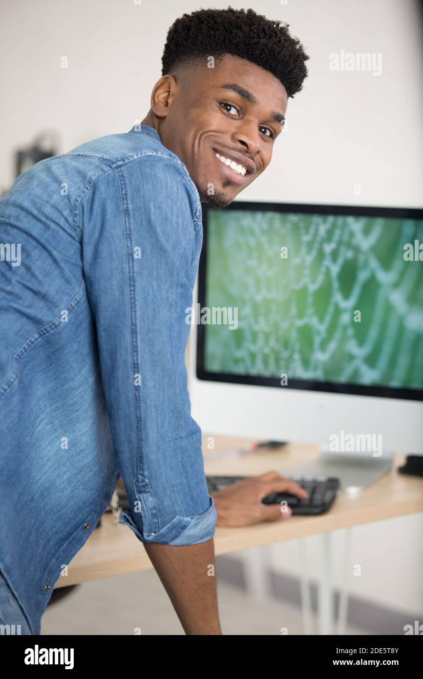 student in class working on computer Stock Photo - Alamy