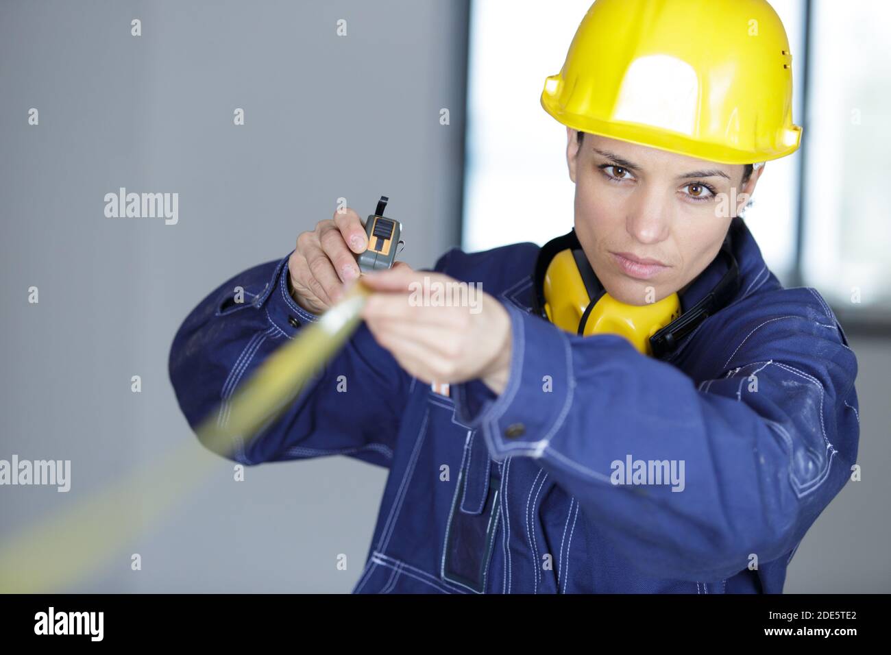 inspector or engineer checking and measuring indoors Stock Photo - Alamy
