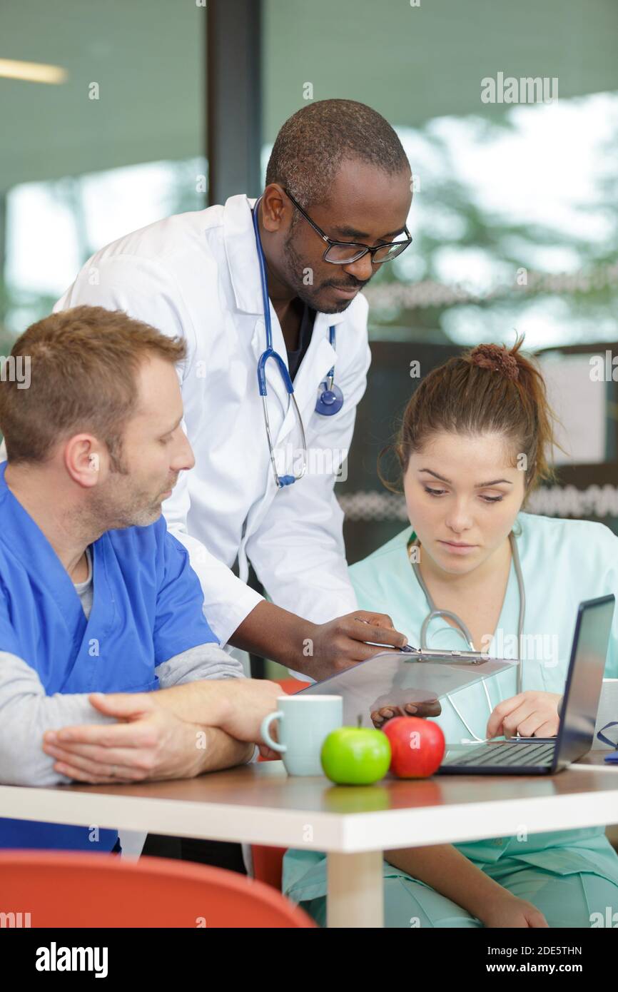 group of doctors with pc computer Stock Photo - Alamy