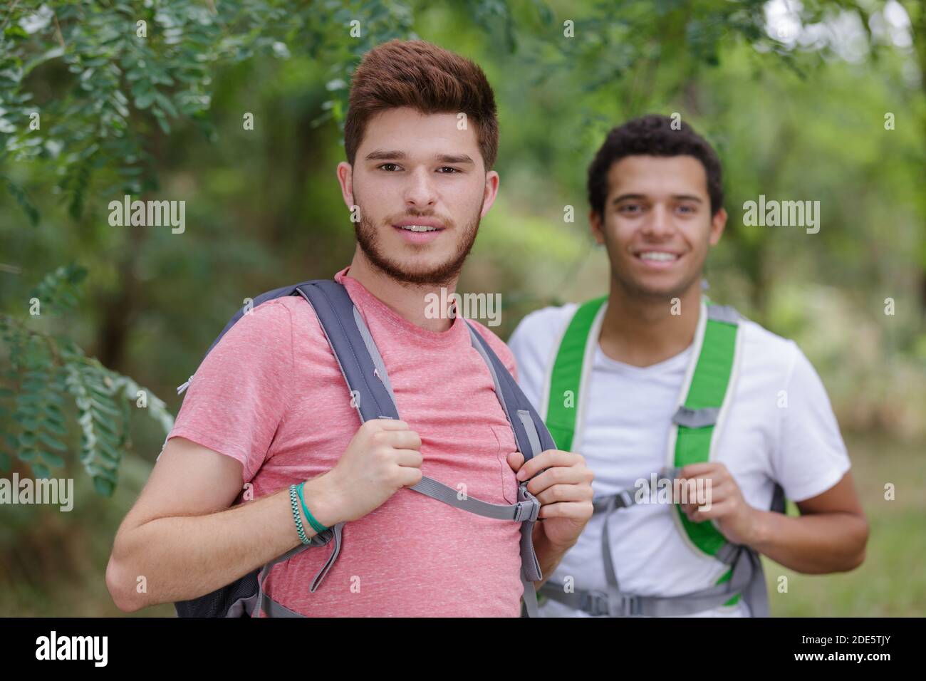 two hikers looking at the camera Stock Photo - Alamy