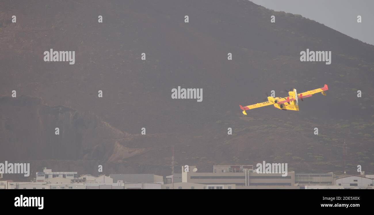 Fire-fighting plane flying over Las Palmas de Gran Canaria. Kingdom of ...
