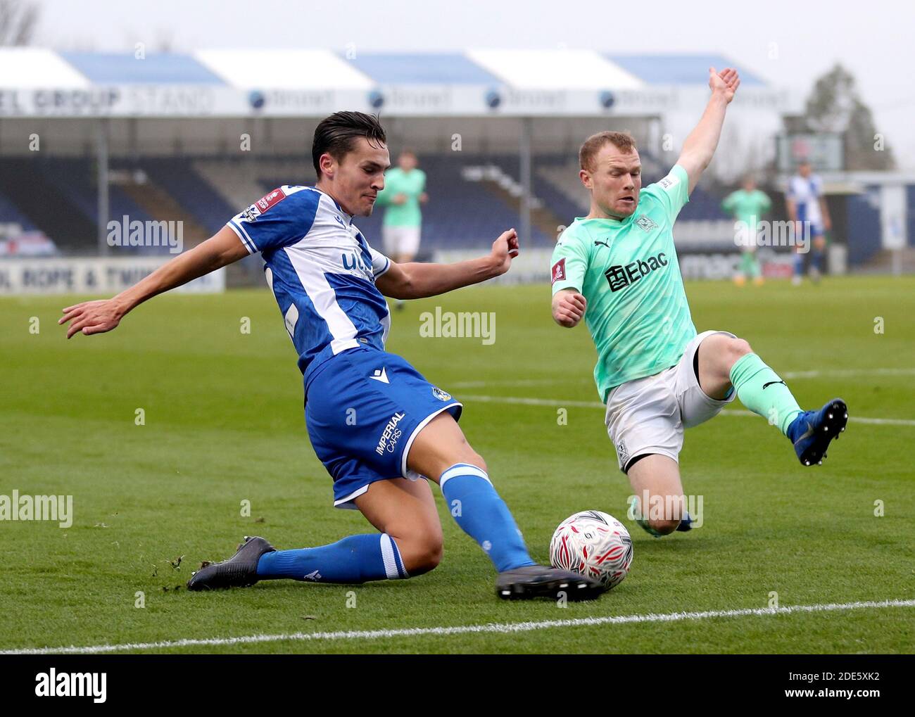 Bristol Rovers' Josh Hare (left) and Darlington's Adam Campbell battle ...