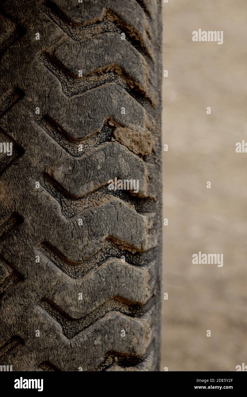 Detail of an old, cracked tractor tire Stock Photo - Alamy