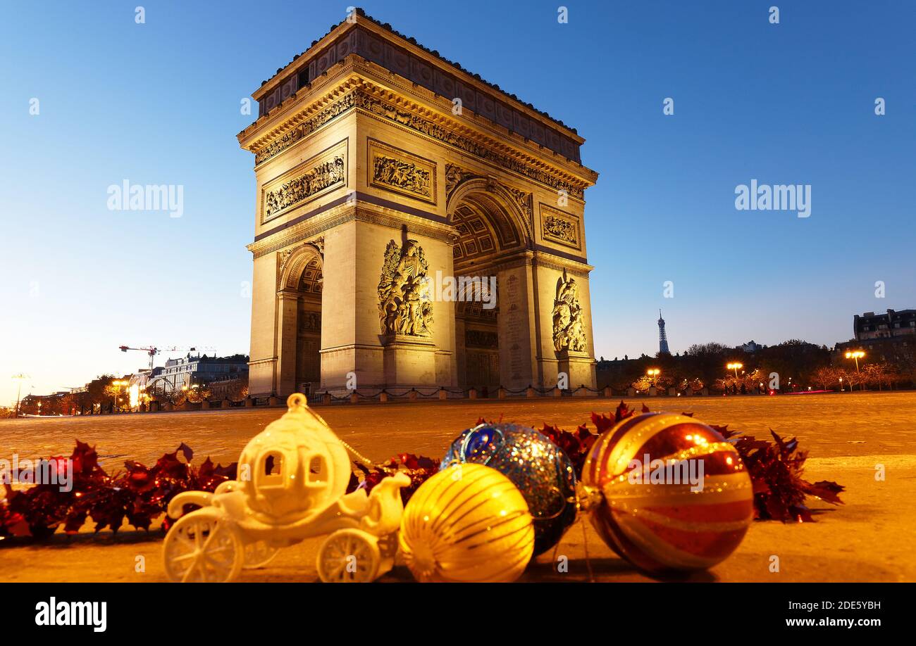 The famous Triumphal Arch at night and Christmas baubles. Paris. France ...
