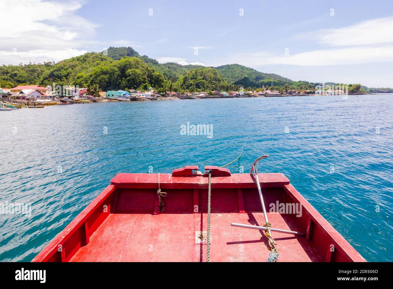 A boat approaches Tingloy town in Batangas, Philippines Stock Photo - Alamy
