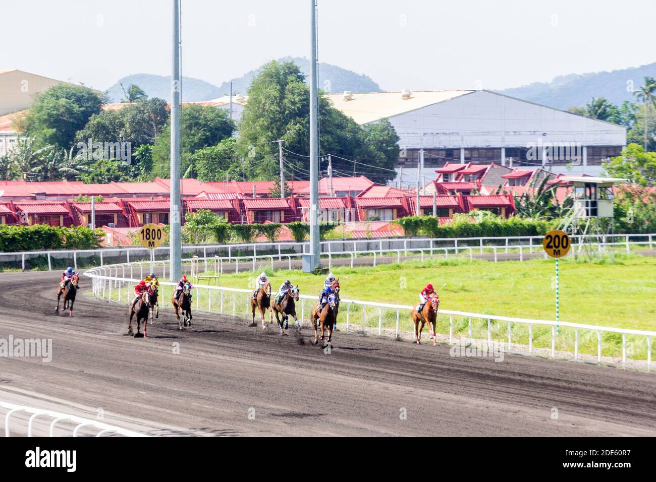 Horse racing at the Metroturf hippodrome in Tanauan, Batangas ...