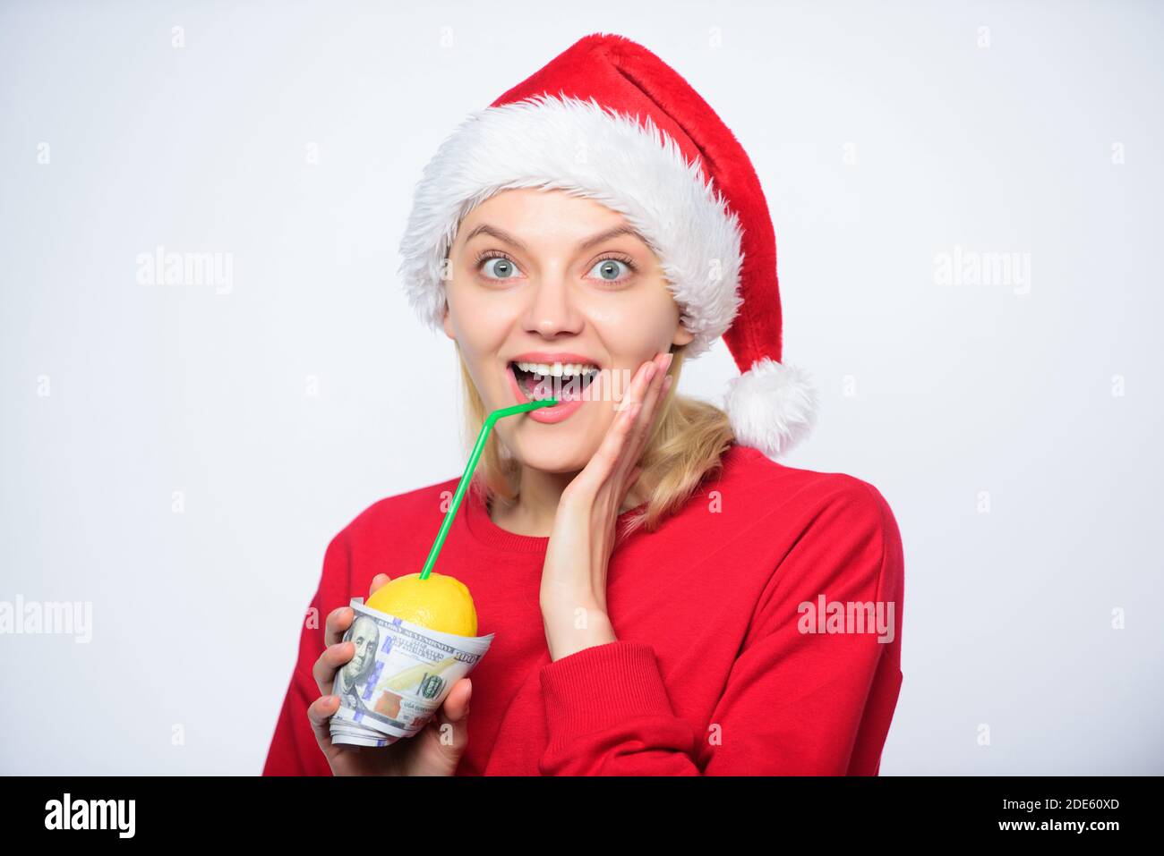 Symbol of wealth and richness. Girl with lemon and money. Lemon money ...