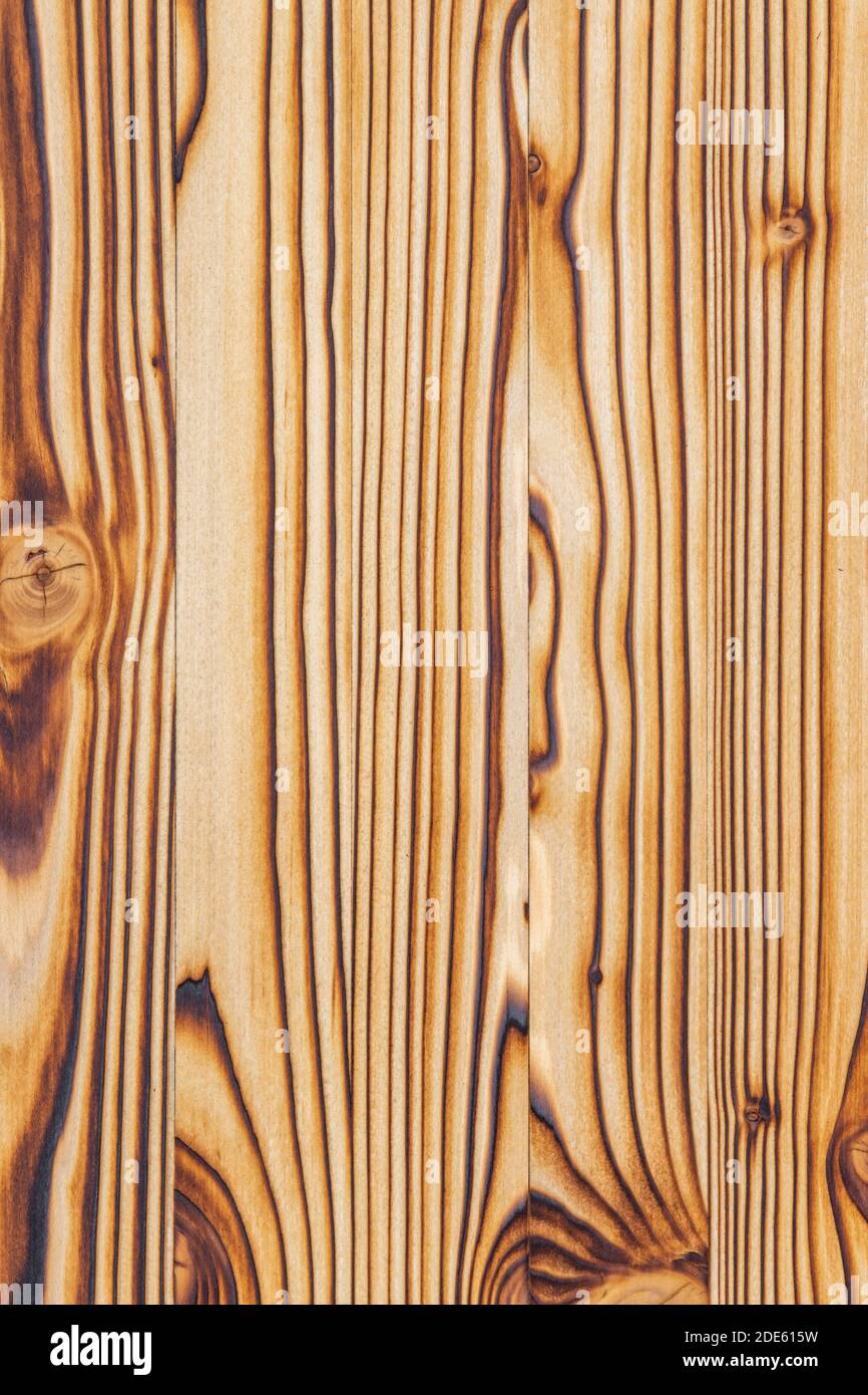 burnt spruce wood as a background Stock Photo - Alamy