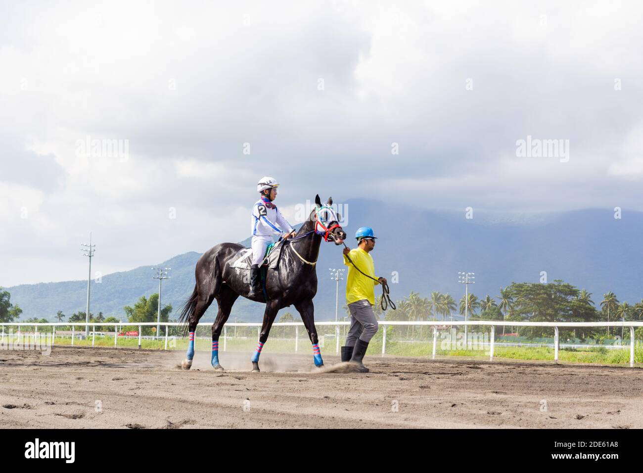 Horse racing at the Metroturf hippodrome in Tanauan, Batangas ...