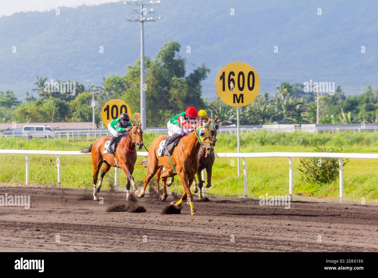 Horse racing at the Metroturf hippodrome in Tanauan, Batangas ...