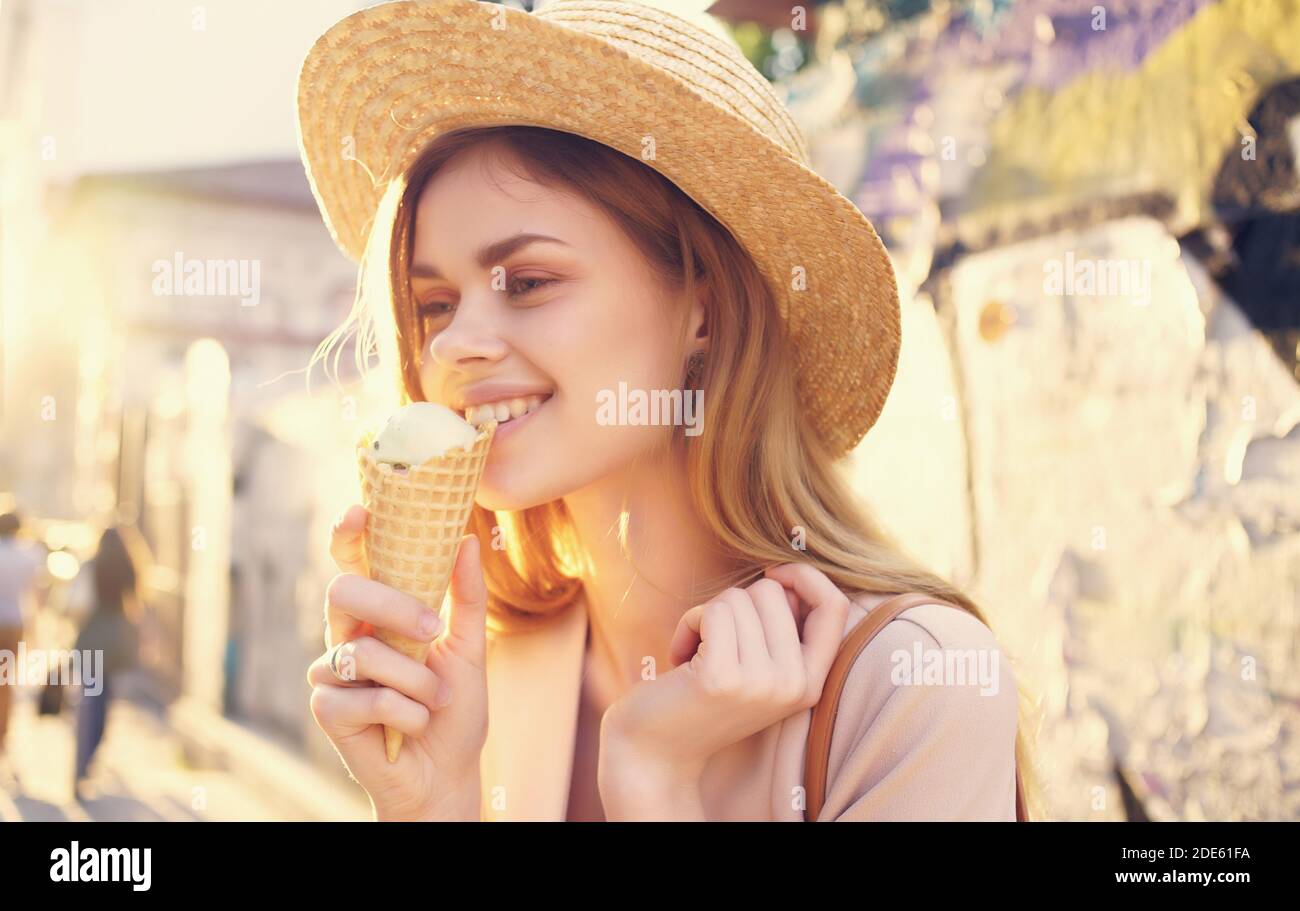 Cheerful woman on the street walk ice cream vacation Stock Photo - Alamy