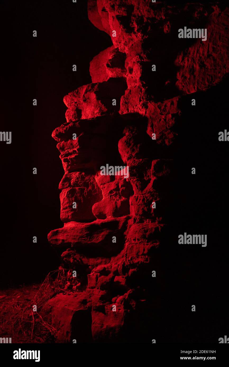 Red lighted stone wall hi-res stock photography and images - Alamy