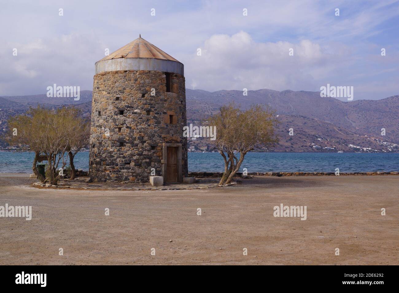 An old windmill built in stone in thea area of Elounda, Eastern Crete ...